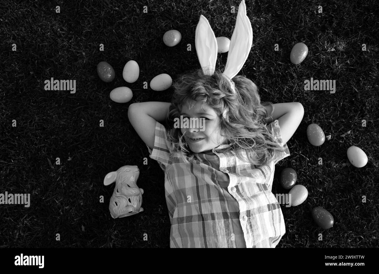 Easter bunny child hunting eggs outdoors Happy Easter day, Kid boy ...