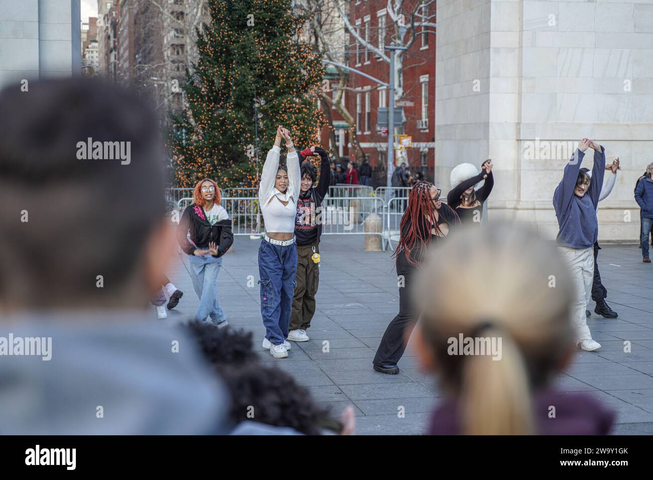 People watch the students dance in the campus. New York University (NYU ...