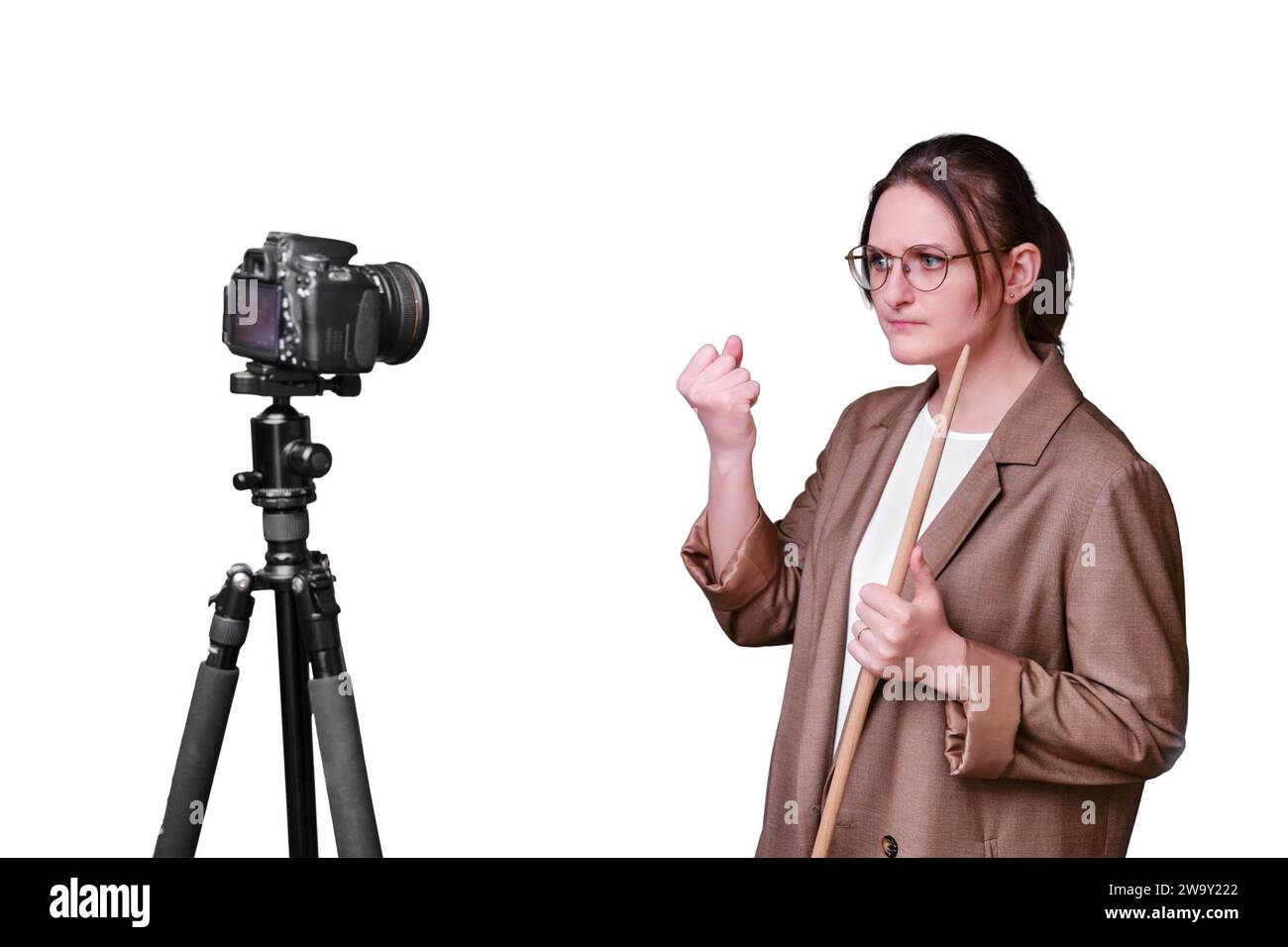 Angry woman teacher with camera on tripod leads online school on ...