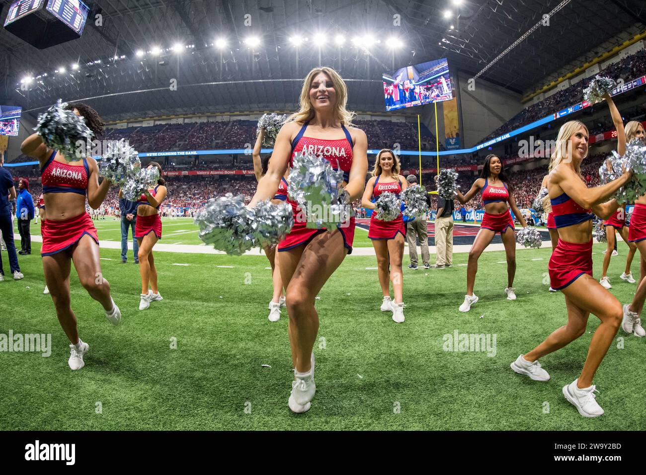 San Antonio, TX, USA. 28th Dec, 2023. The Arizona Pomline dance team performs during the Valero ...
