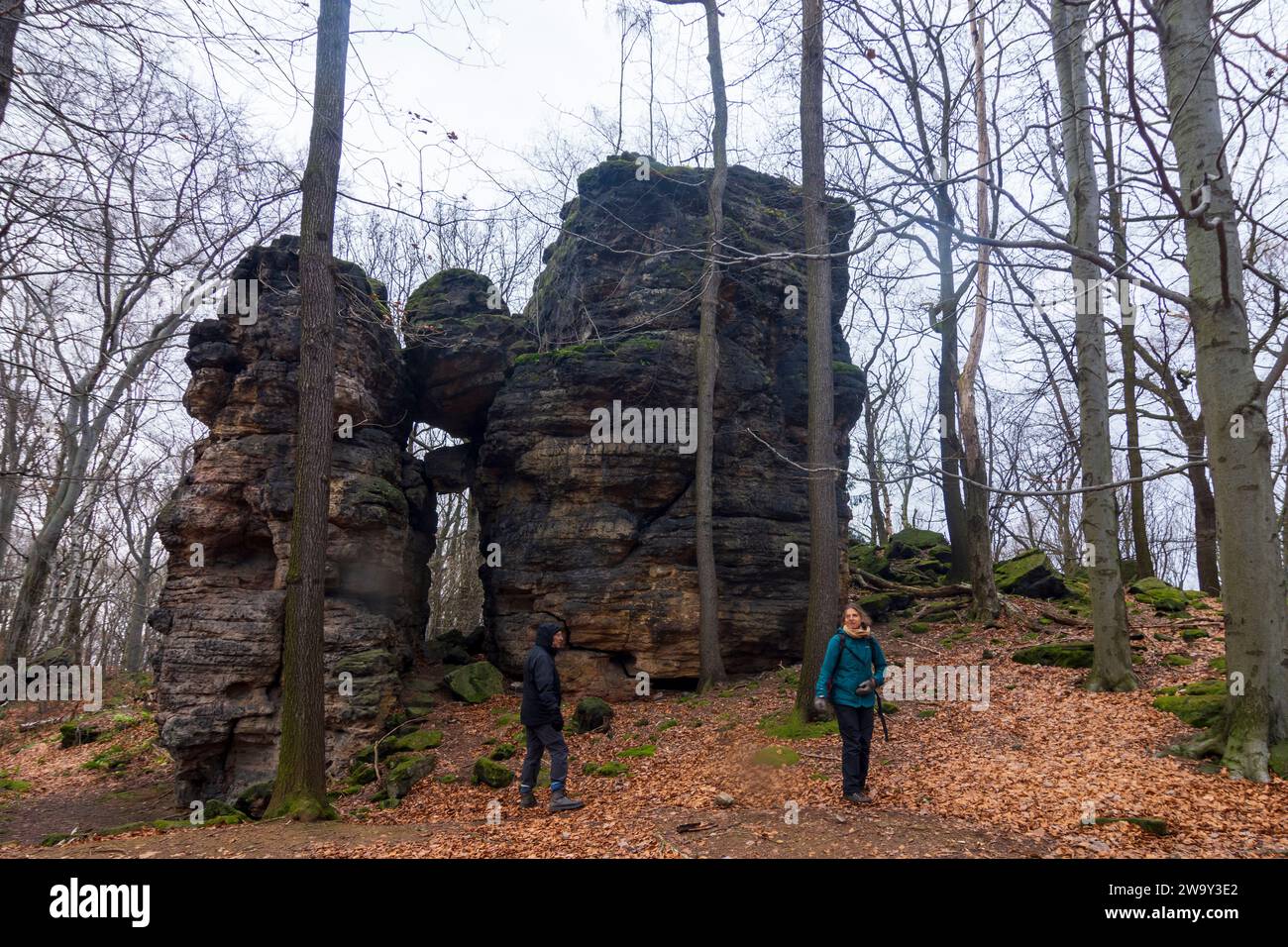 Bad Gottleuba-Berggießhübel: rock formation Hochstein, hiker in ...