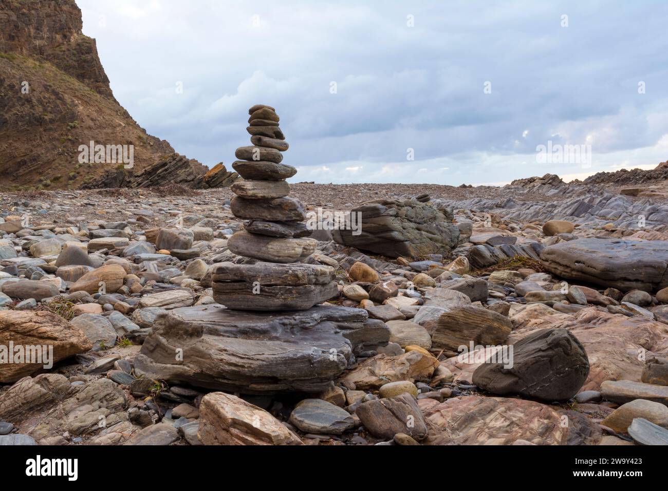 Rock cairn on the rocky beach at Second Valley, South Australia, as the ...