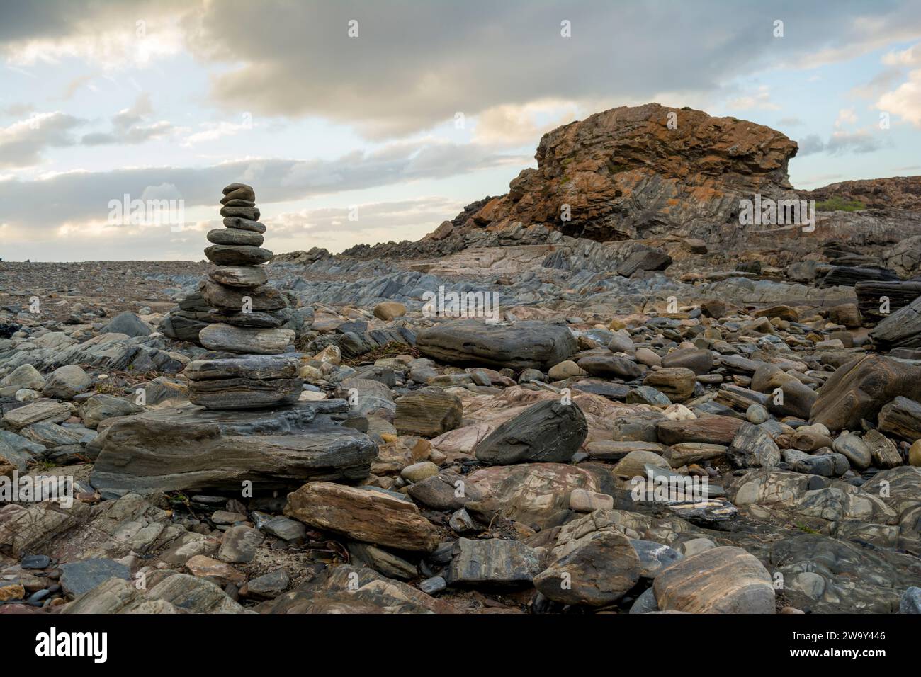 Rock cairn on the rocky beach at Second Valley, South Australia, as the ...