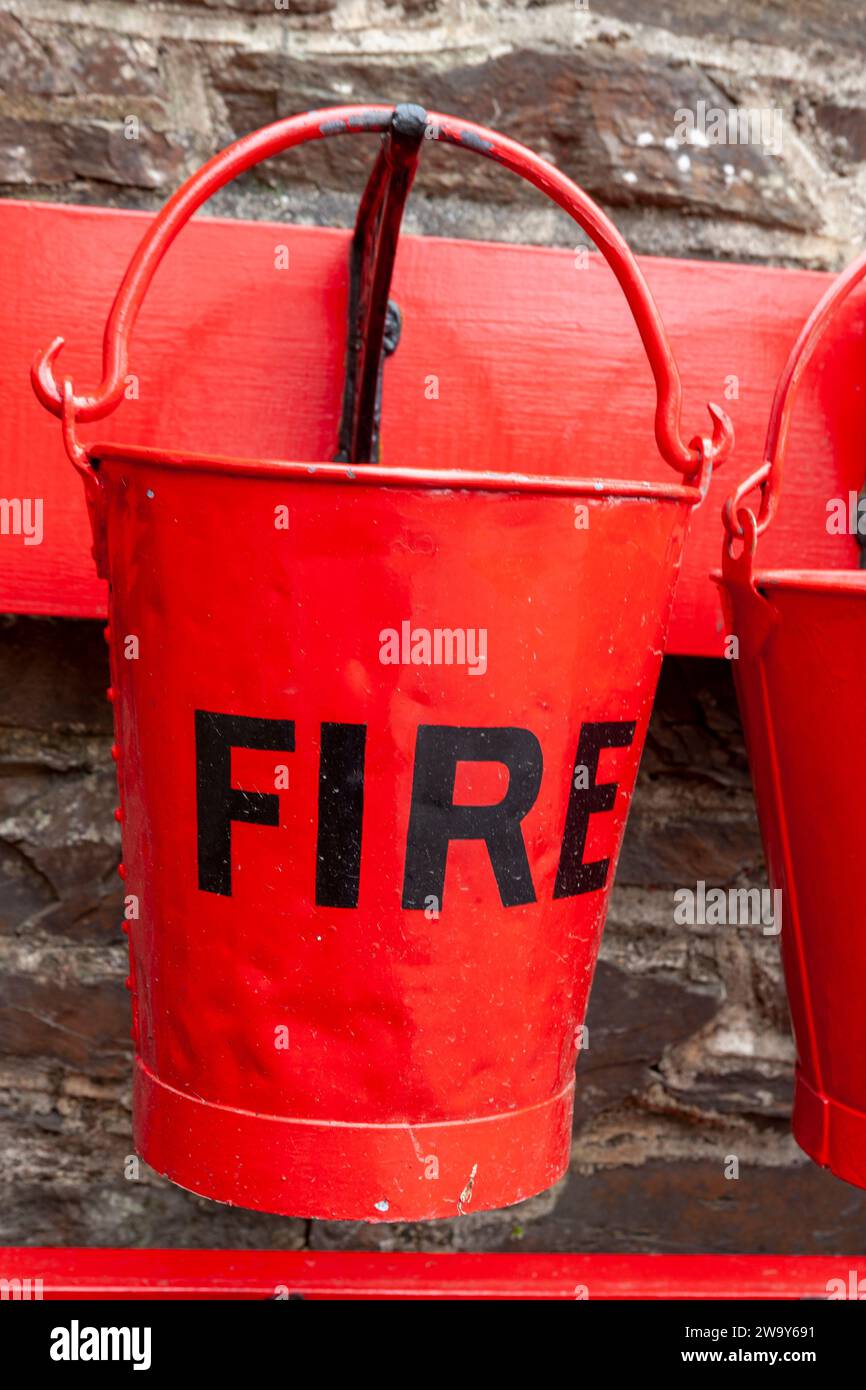 Close-up of a traditional fire-bucket on the platform at Woody Bay ...