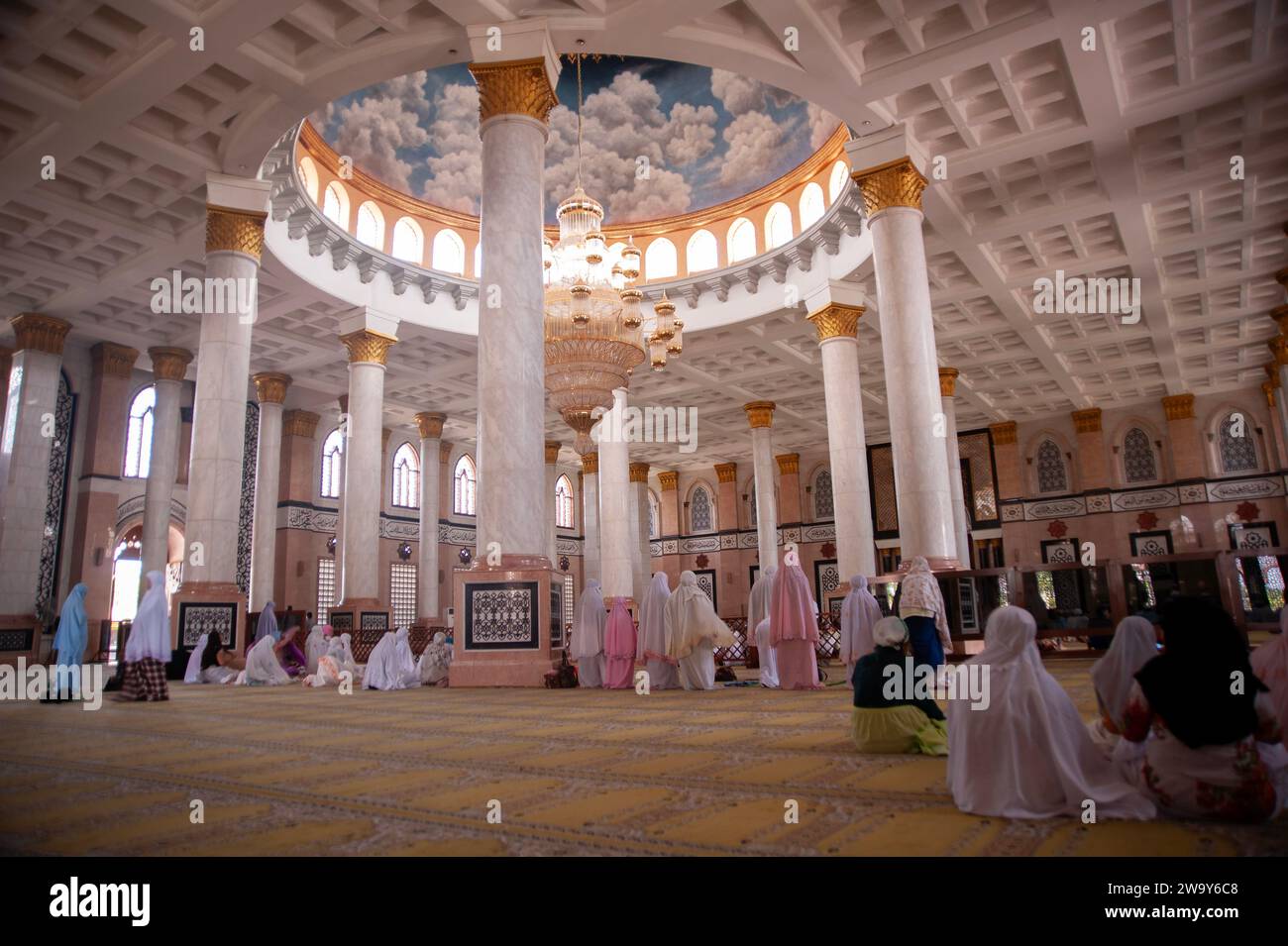 iInterior with women worshippers, Dian Al-Mahri Mosque, also known as ...