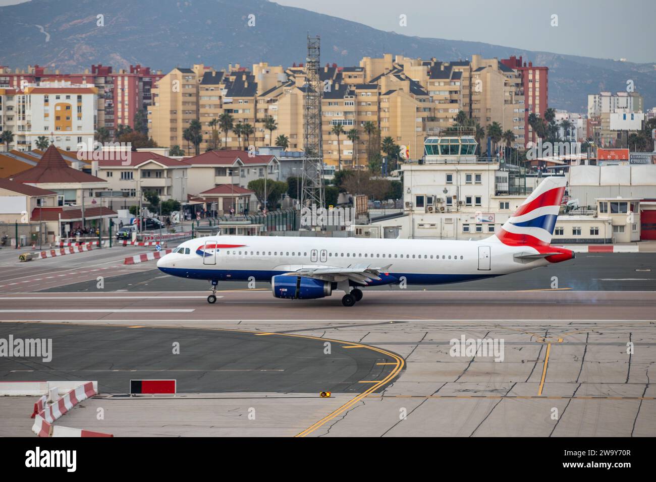 This photo shows an airplane landing at the airport of Gibraltar Stock ...