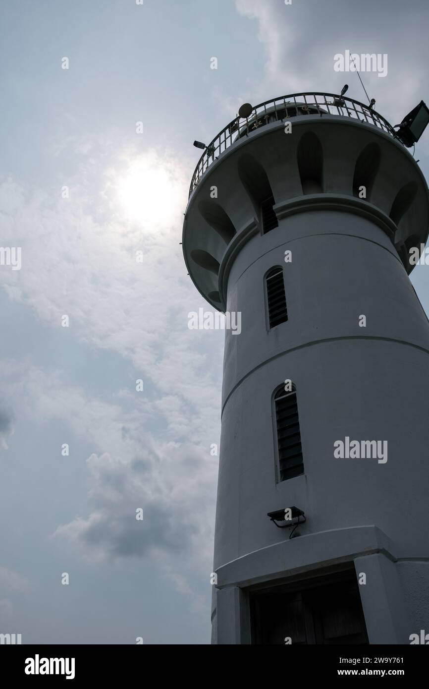 Raffles Marina Lighthouse Sunset Glow Stock Photo - Alamy
