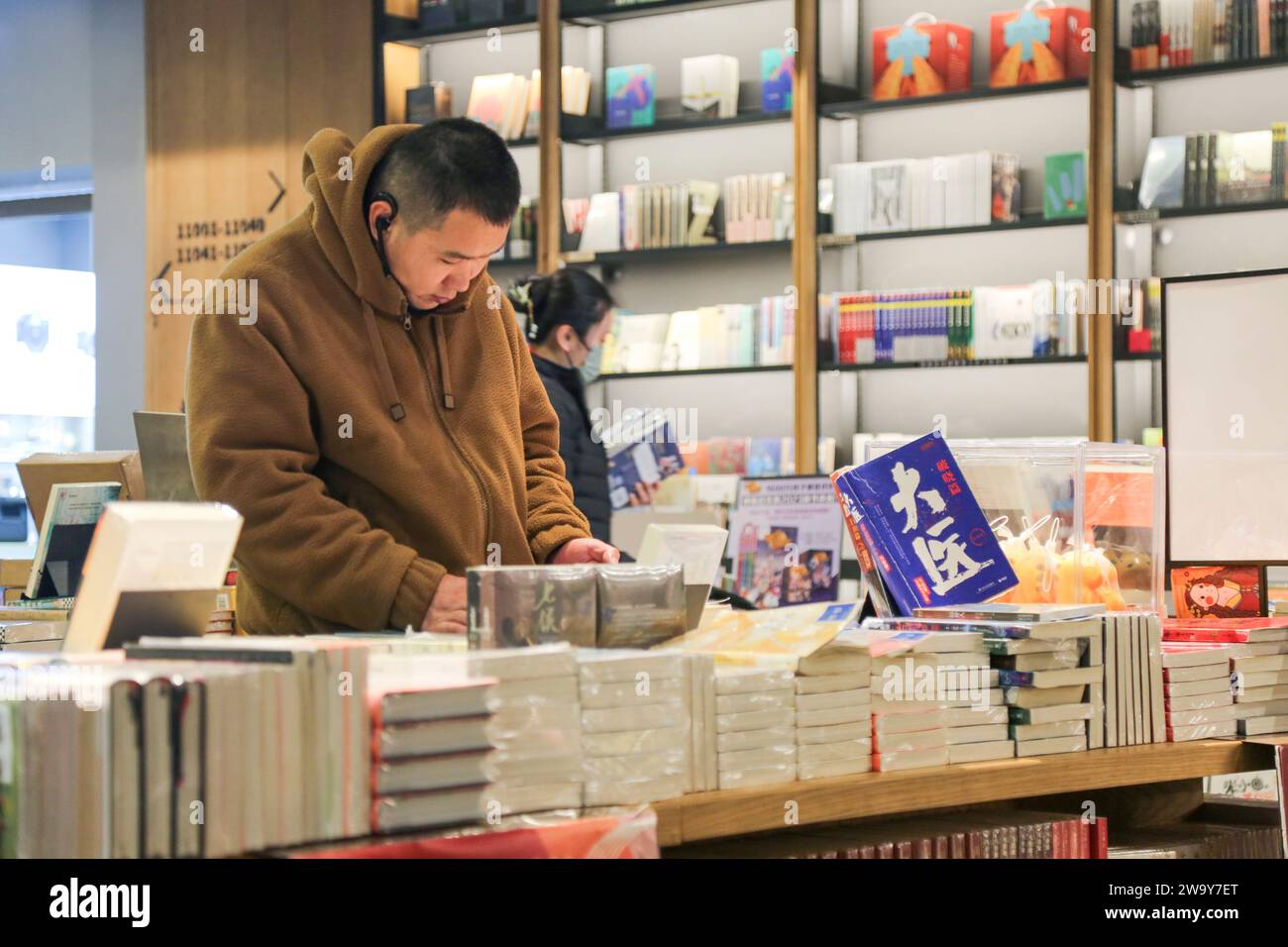 NANJING, CHINA - DECEMBER 31, 2023 - Readers shop for books at ...