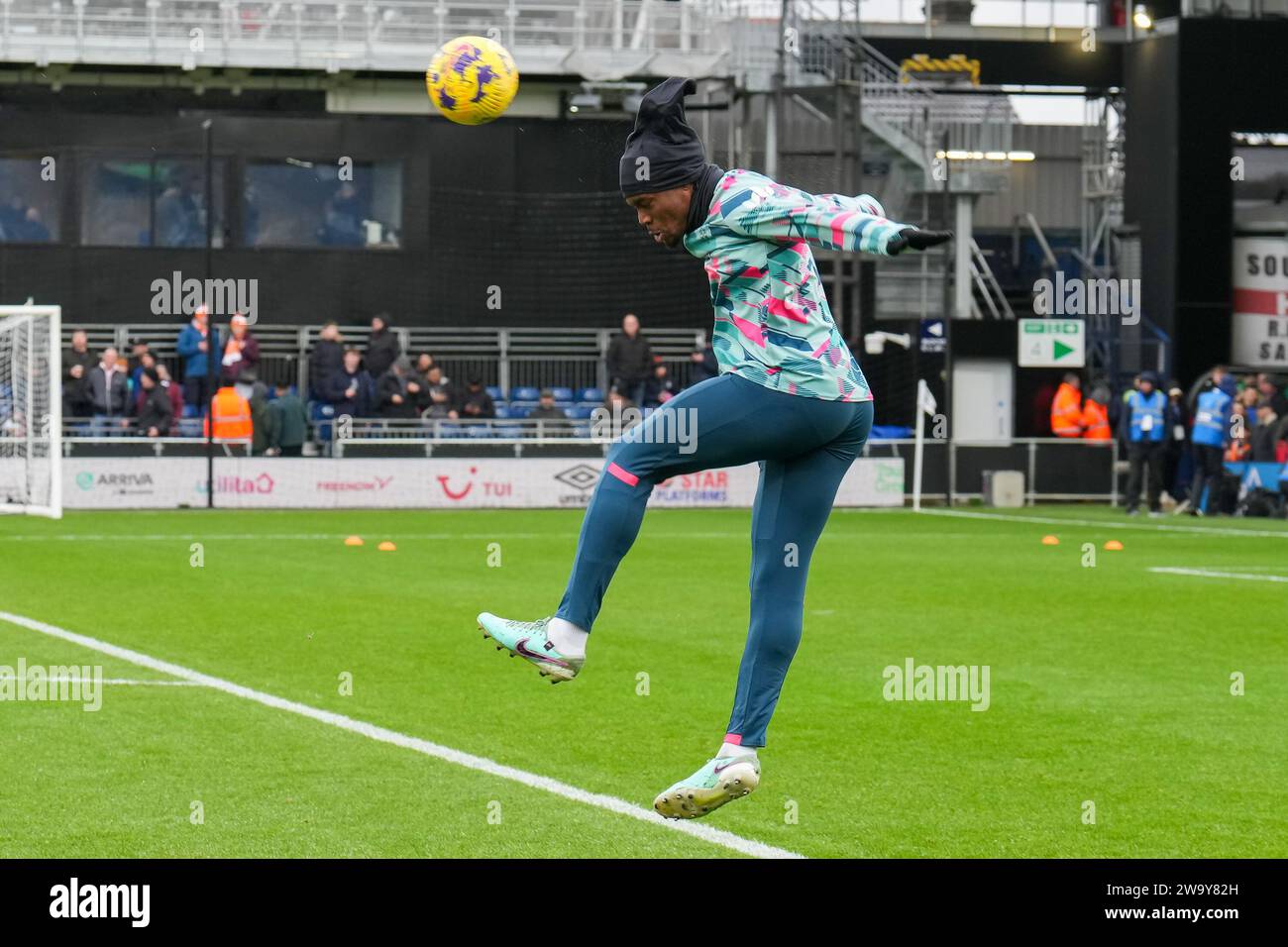 Luton, UK. 30th Dec, 2023. Teden Mengi (15) of Luton Town ahead of the ...