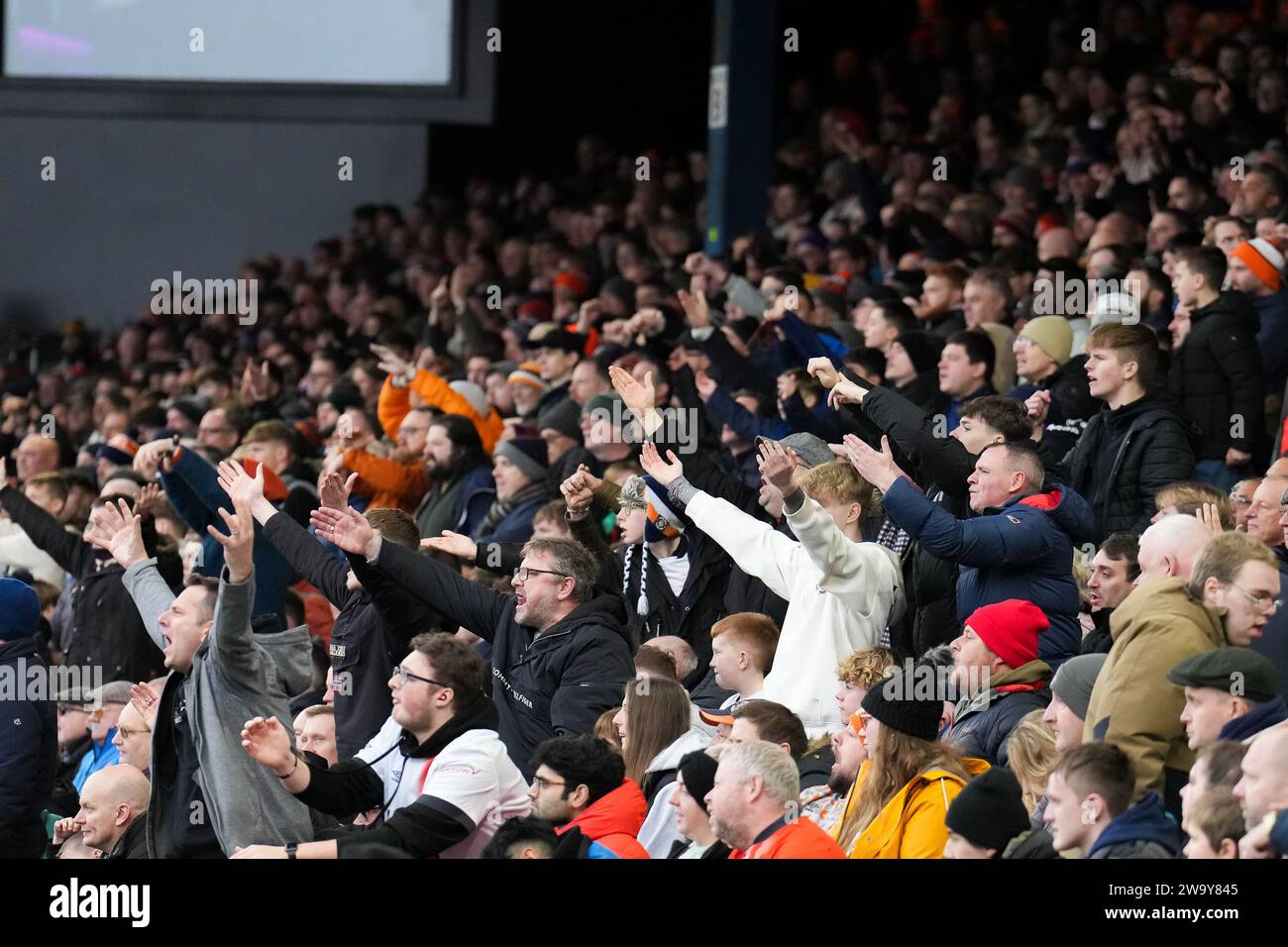 Luton, UK. 30th Dec, 2023. Luton Town supporters during the Premier ...