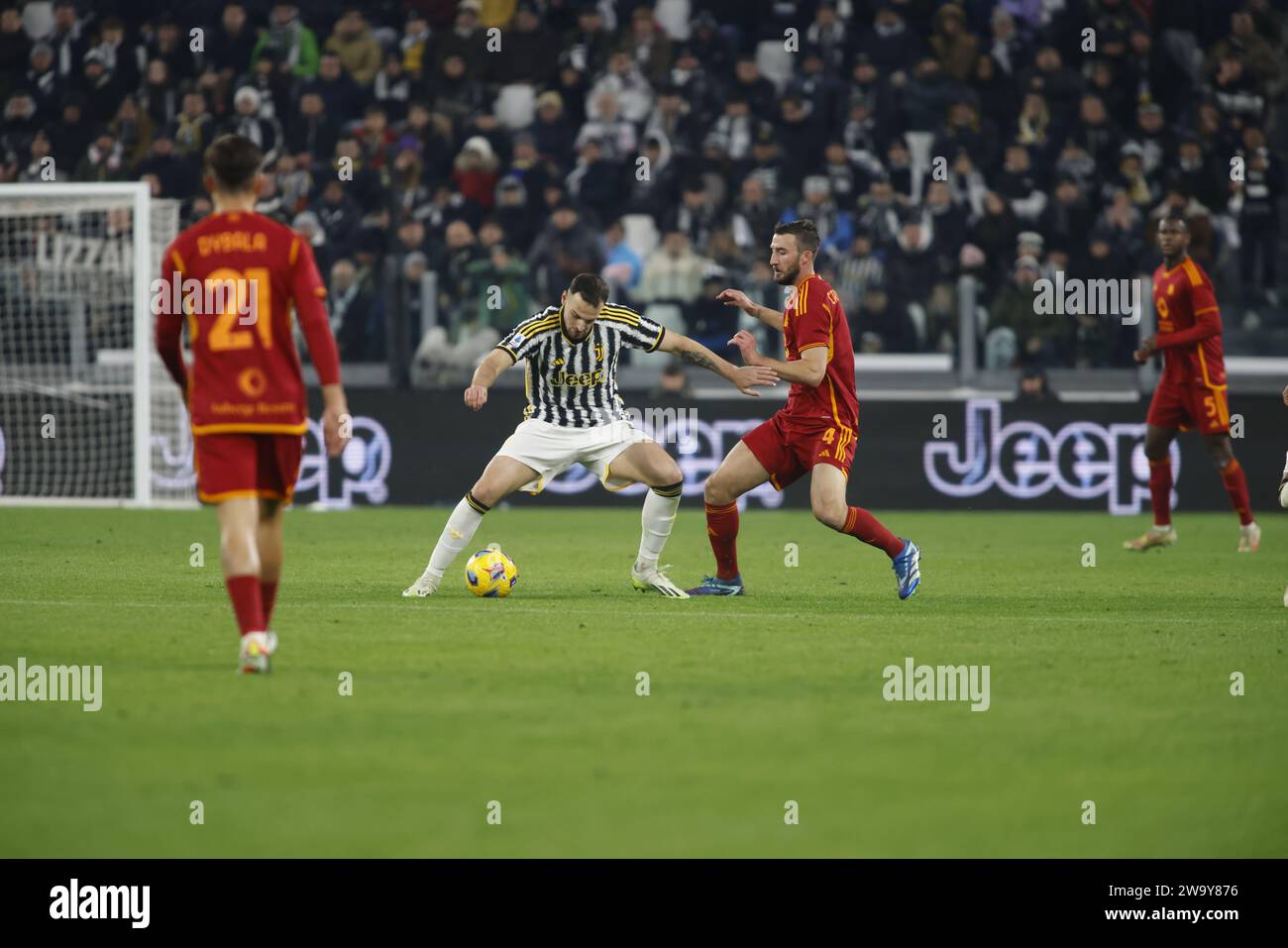 Torino, Italy. 30th Dec, 2023. Federico Gatti of Juventus (L) and Bryan ...