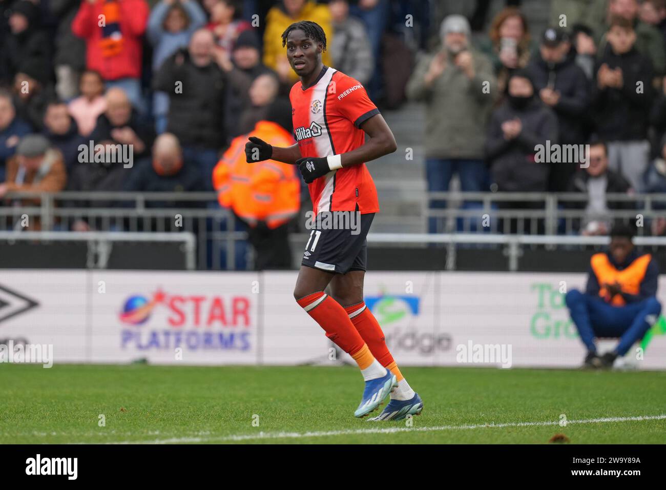 Luton, UK. 30th Dec, 2023. Elijah Adebayo (11) of Luton Town during the ...