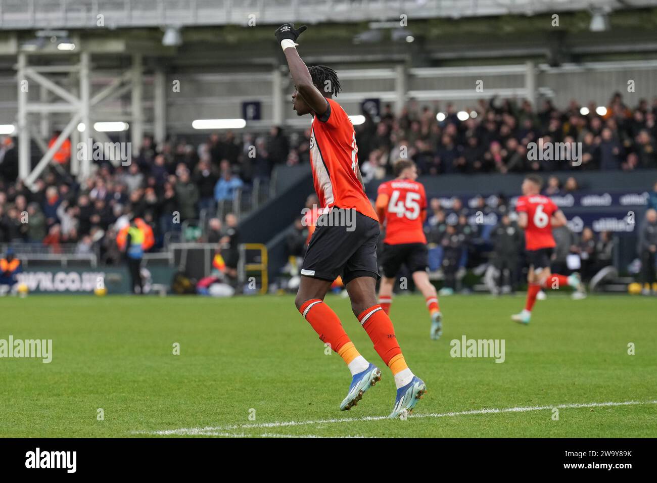 Luton, UK. 30th Dec, 2023. Elijah Adebayo (11) of Luton Town celebrates ...