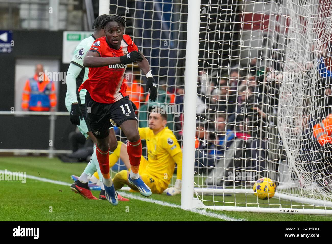 Luton, UK. 30th Dec, 2023. Elijah Adebayo (11) of Luton Town celebrates ...