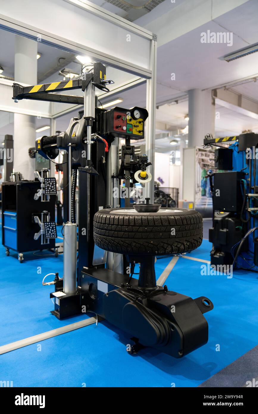 Car wheel balancing device for tire fitting Stock Photo - Alamy