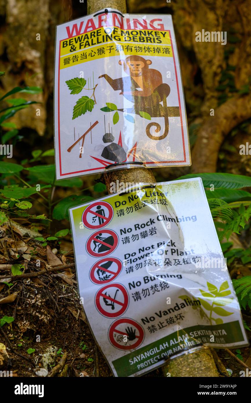 Beware of monkeys and falling rocks warning sign at Geotapak, Ipoh ...