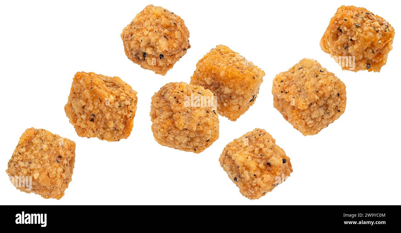 Deep fried breaded tofu cubes isolated on white background Stock Photo ...