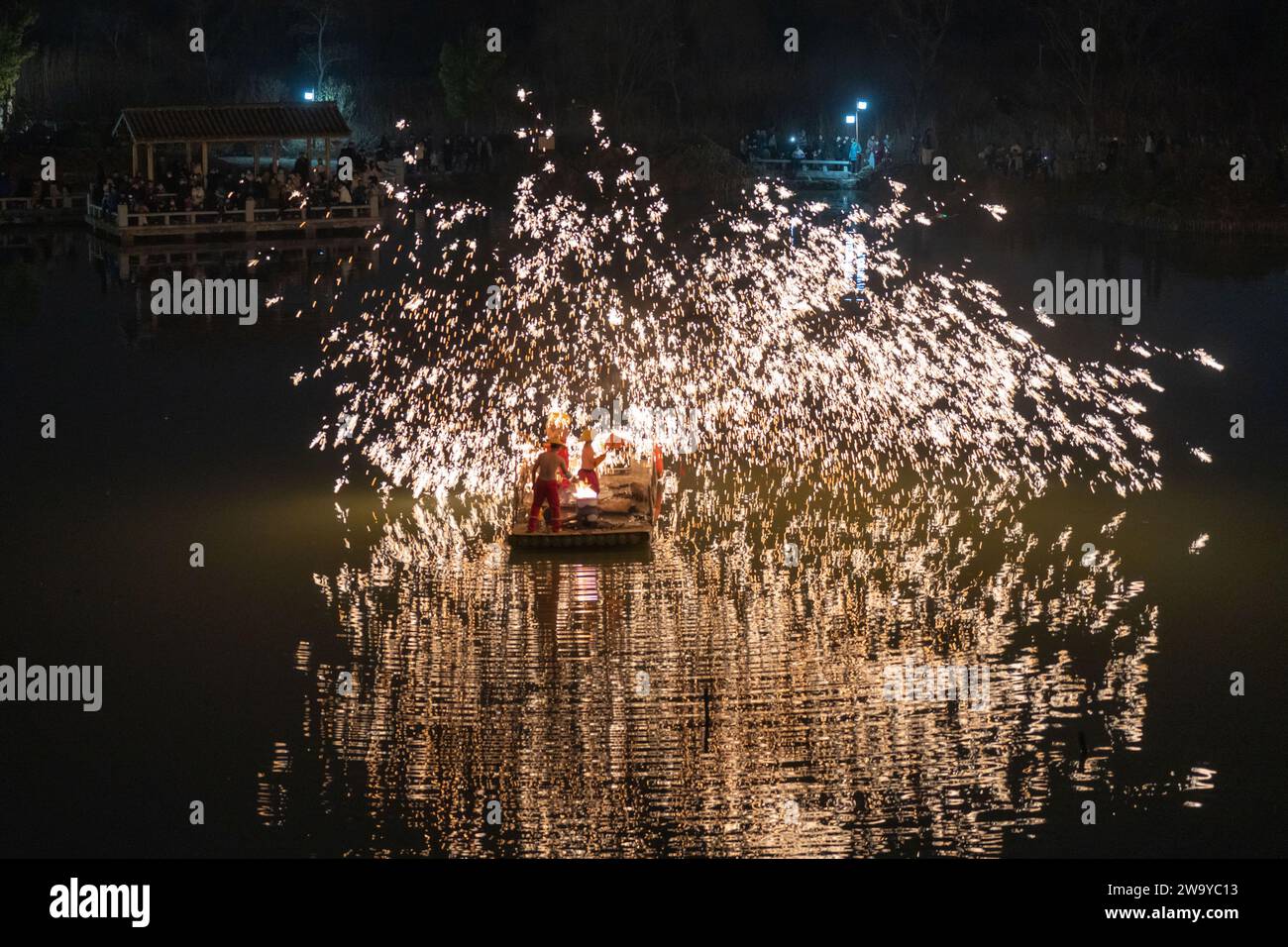 Tourists are enjoying a performance of Striking Iron Flower to welcome ...