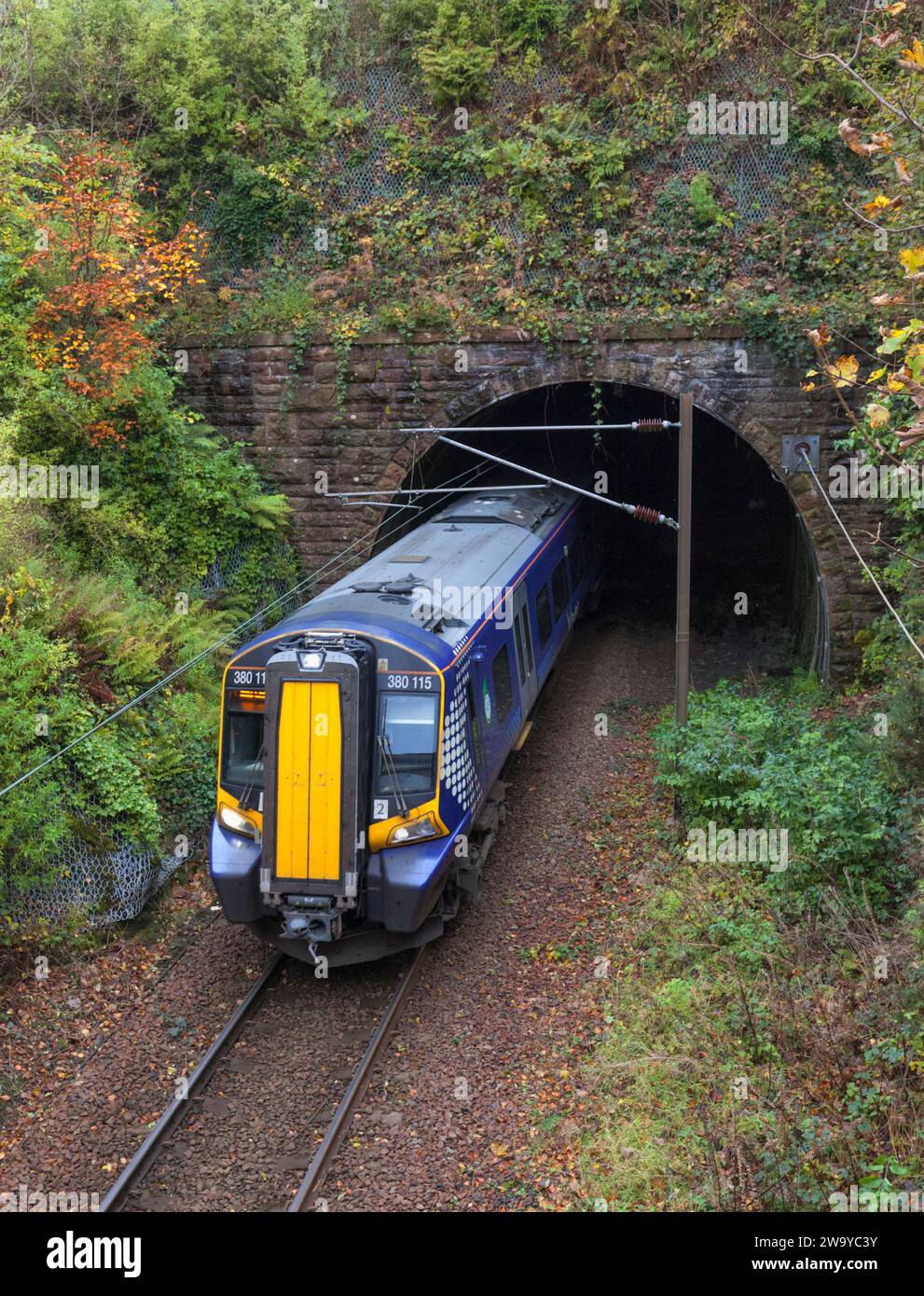 Scotrail Siemens class 380 electric train emerging from Fairlie tunnel ...