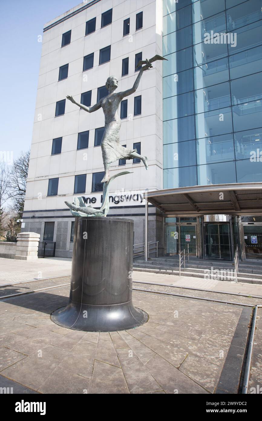 A statue of a woman and a bird at Kingsway, Cardiff, Wales in the UK ...