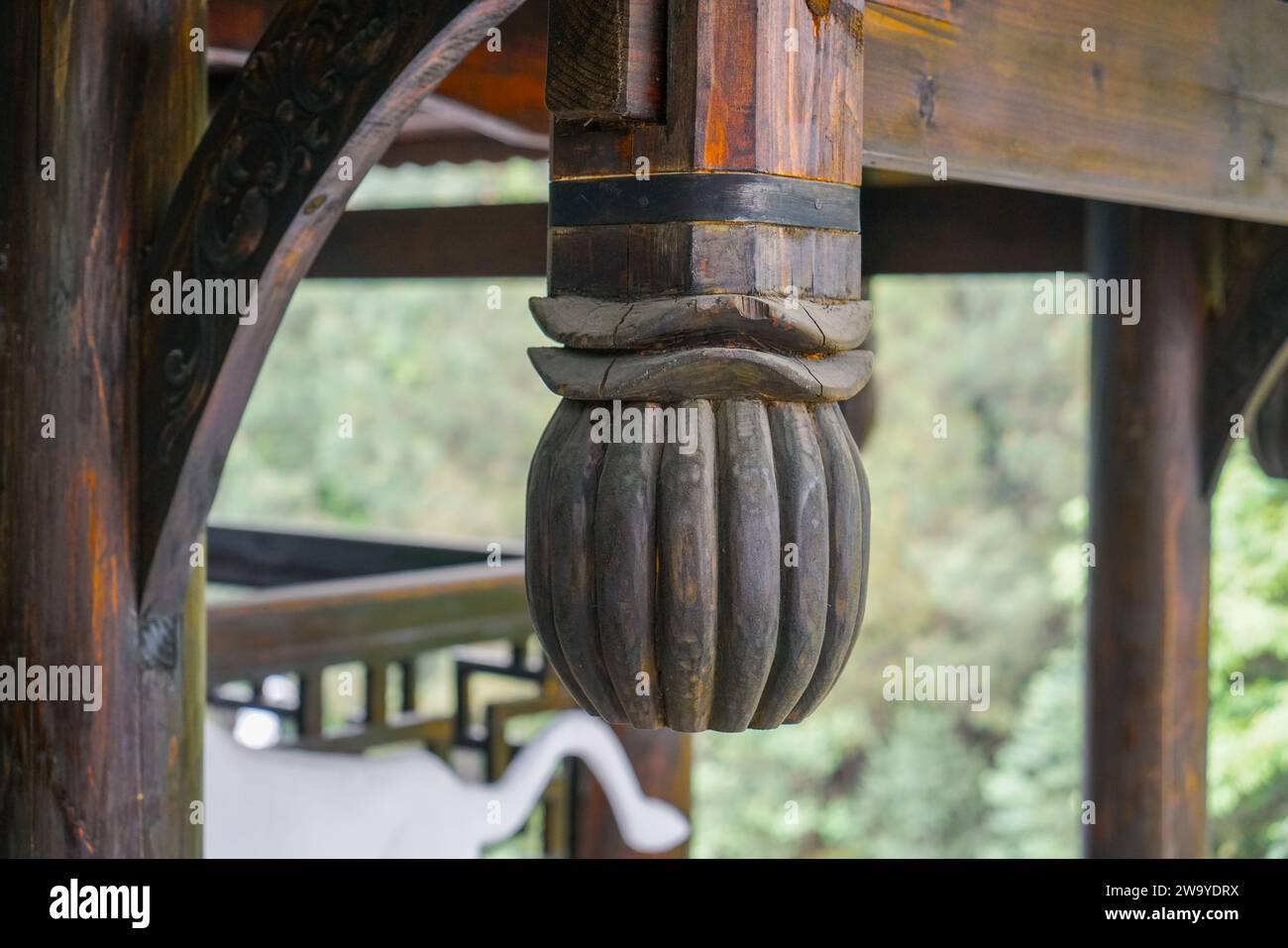 Wooden decorations on the eaves of Enshi Tushi Castle. Enshi Tushi ...