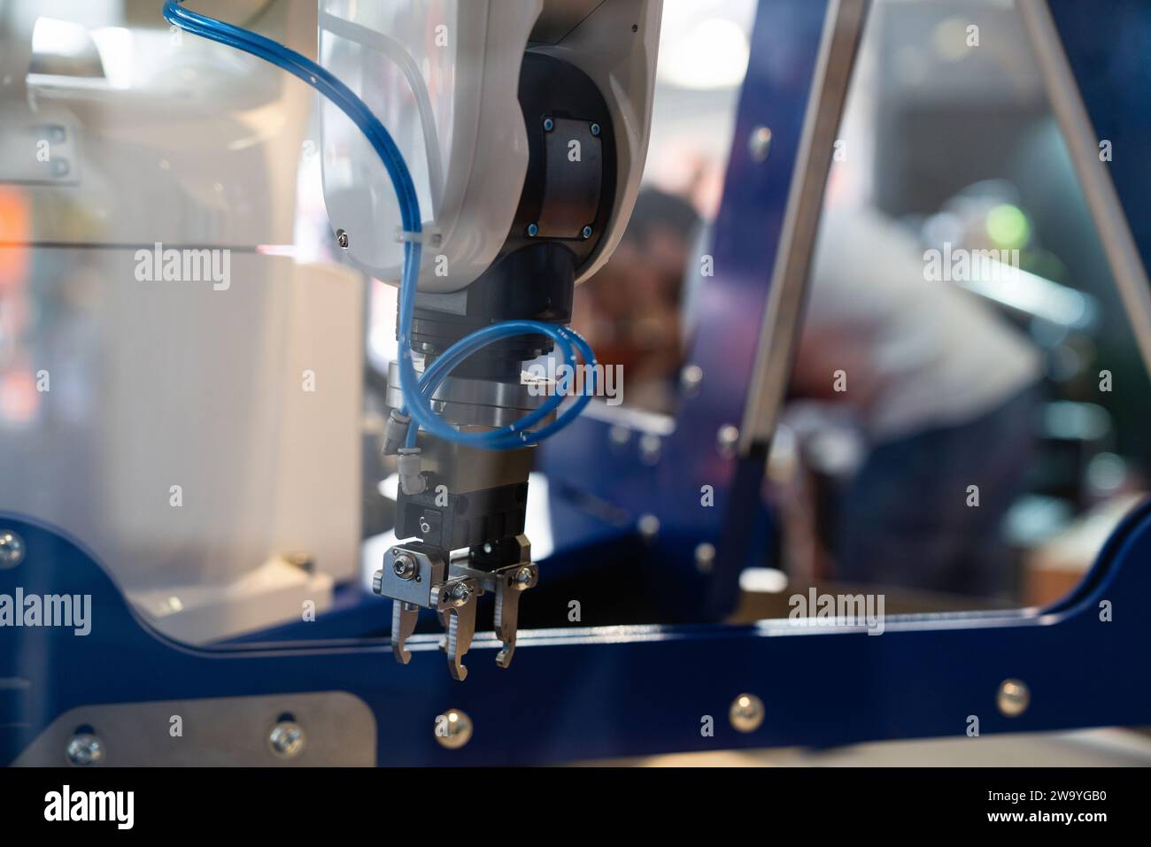 Modern handling robot - robotic arm. Smart factory Stock Photo - Alamy