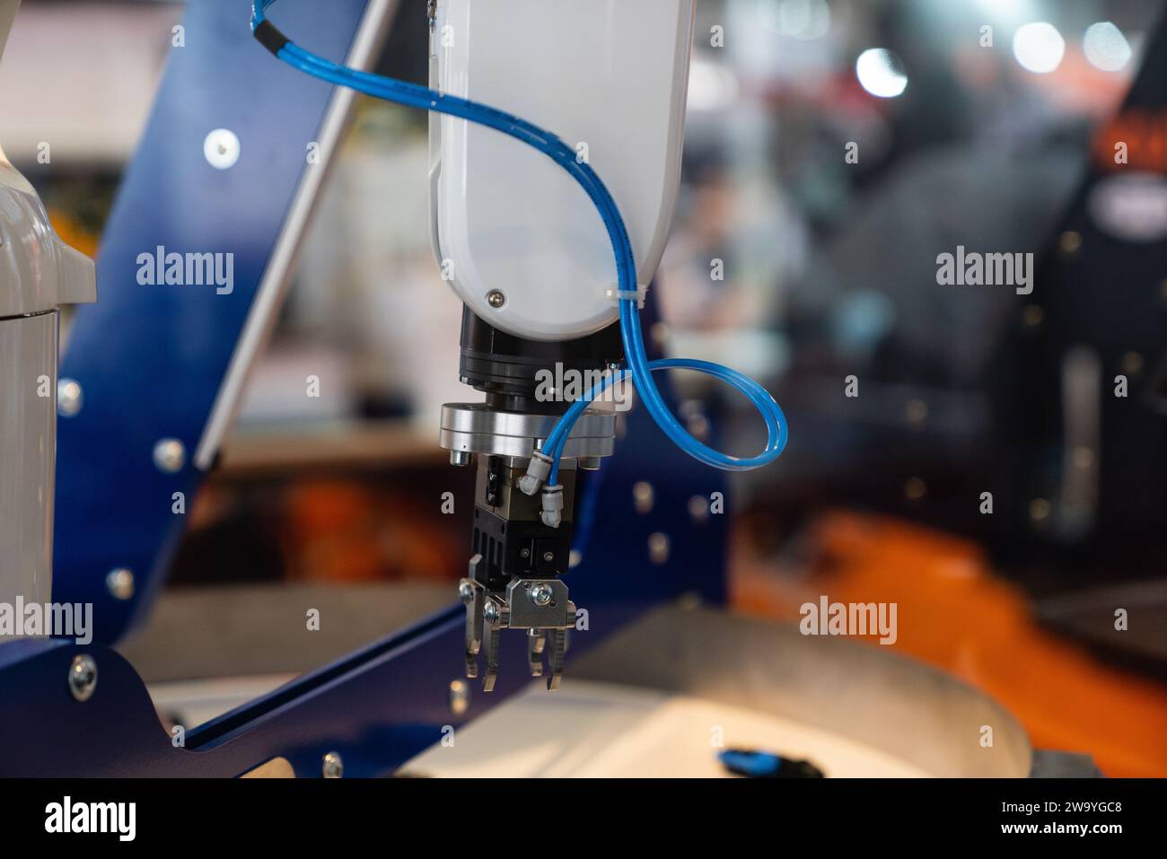 Modern handling robot - robotic arm. Smart factory Stock Photo - Alamy