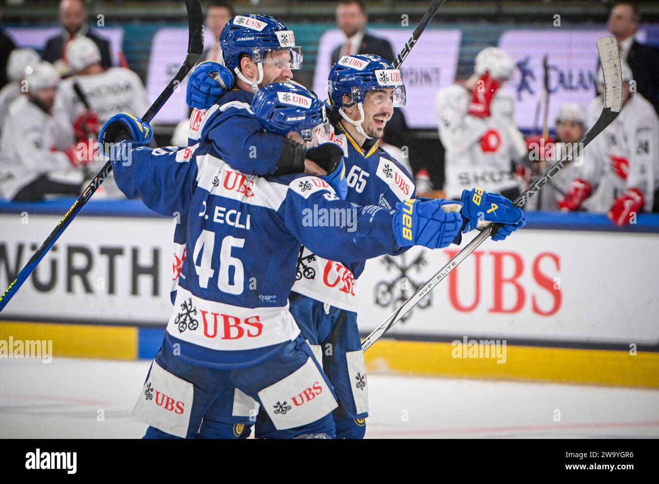Davos' Klas Dahlbeck and Marc Wieser celebrate during the game between ...
