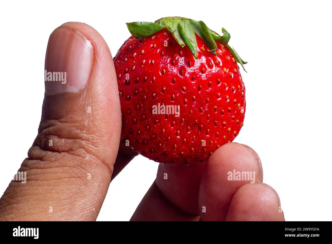 Red berry strawberry in hand isolated on white background Stock Photo ...