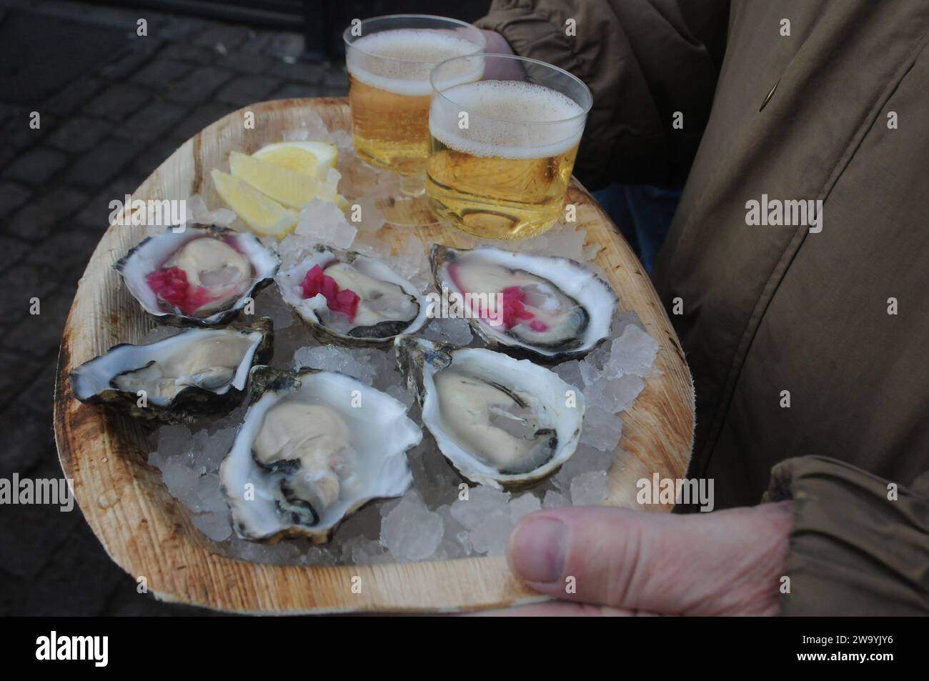 Copenhagen, Denmark /31 December 2023/Travellers and local enjoy osters ...