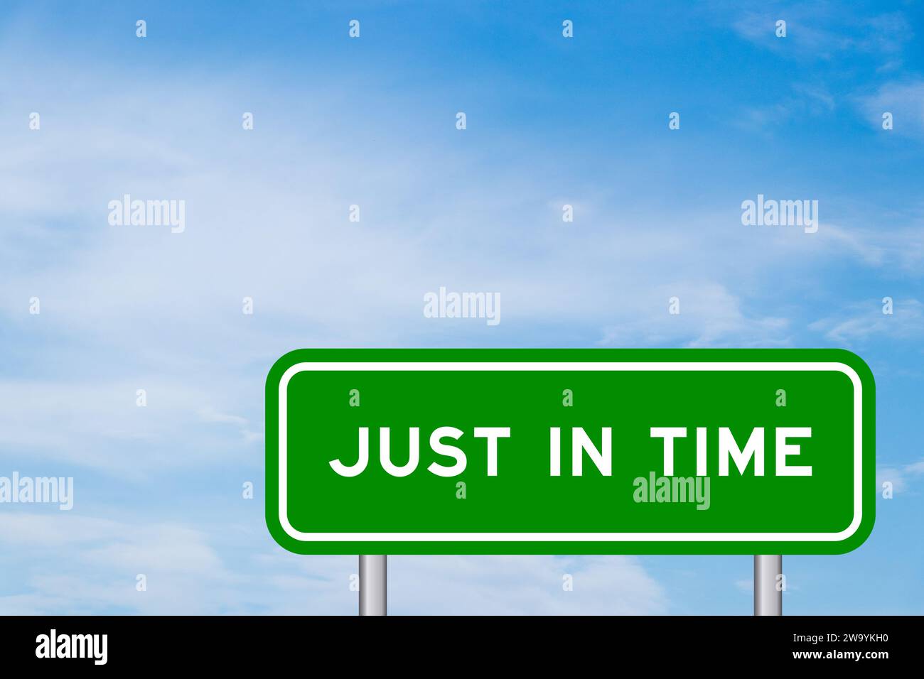 Green color transportation sign with word just in time on blue sky with ...