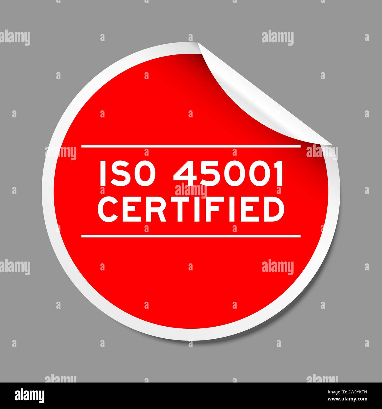 Red color peel sticker label with word ISO 45001 certified on gray ...