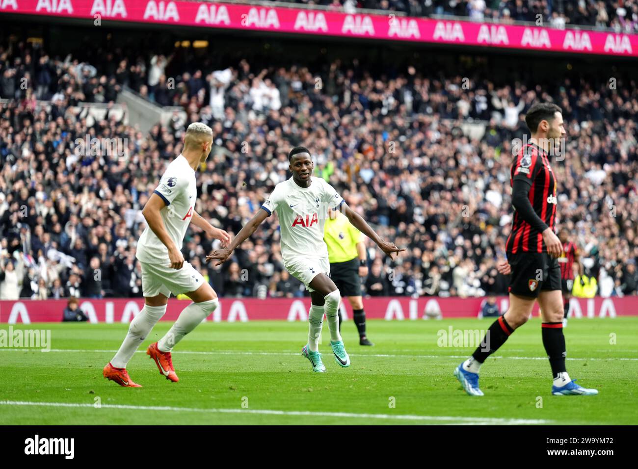 Tottenham Hotspur's Pape Matar Sarr (centre) celebrates scoring their ...