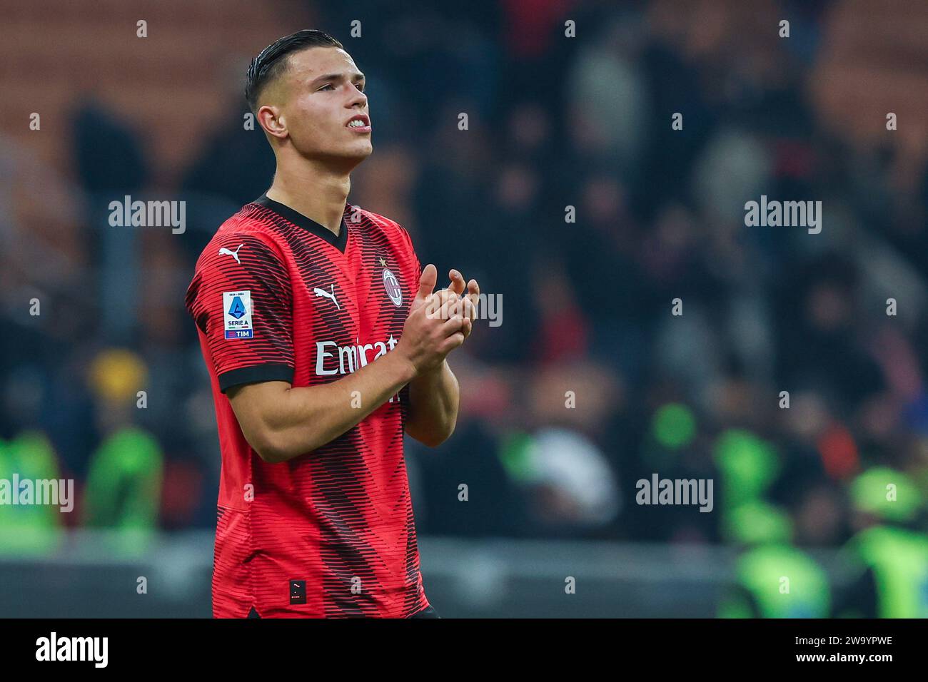 Milan, Italy. 30th Dec, 2023. Jan-Carlo Simic of AC Milan greets the fans during Serie A 2023/24 ...