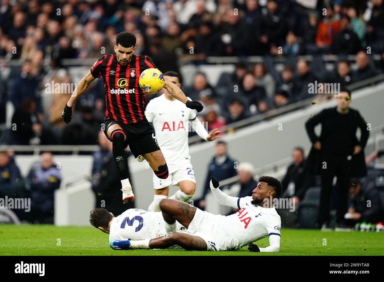Bournemouth's Dominic Solanke (centre) tackled by Tottenham Hotspur's ...