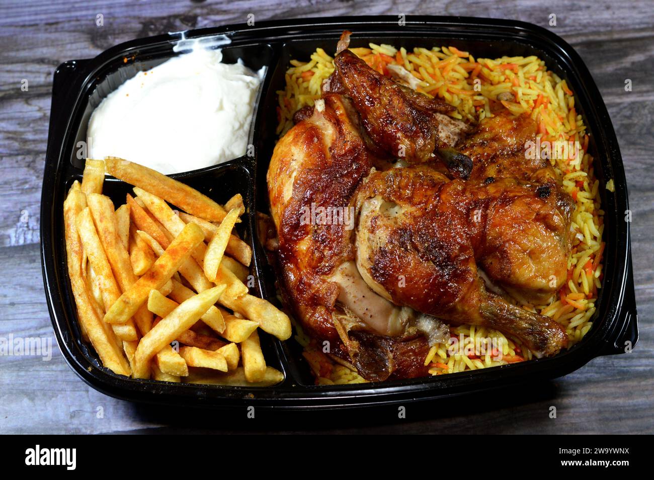 Arabic Syrian cuisine of machine grilled barbecued chicken with ...