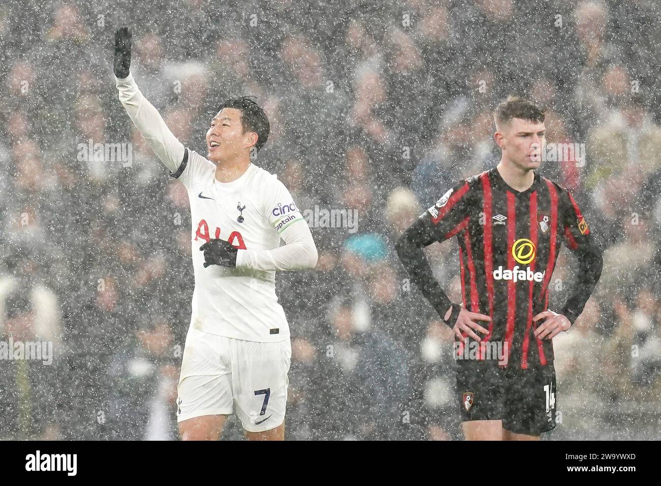 Tottenham Hotspur's Son Heung-Min (left) celebrates scoring their side ...