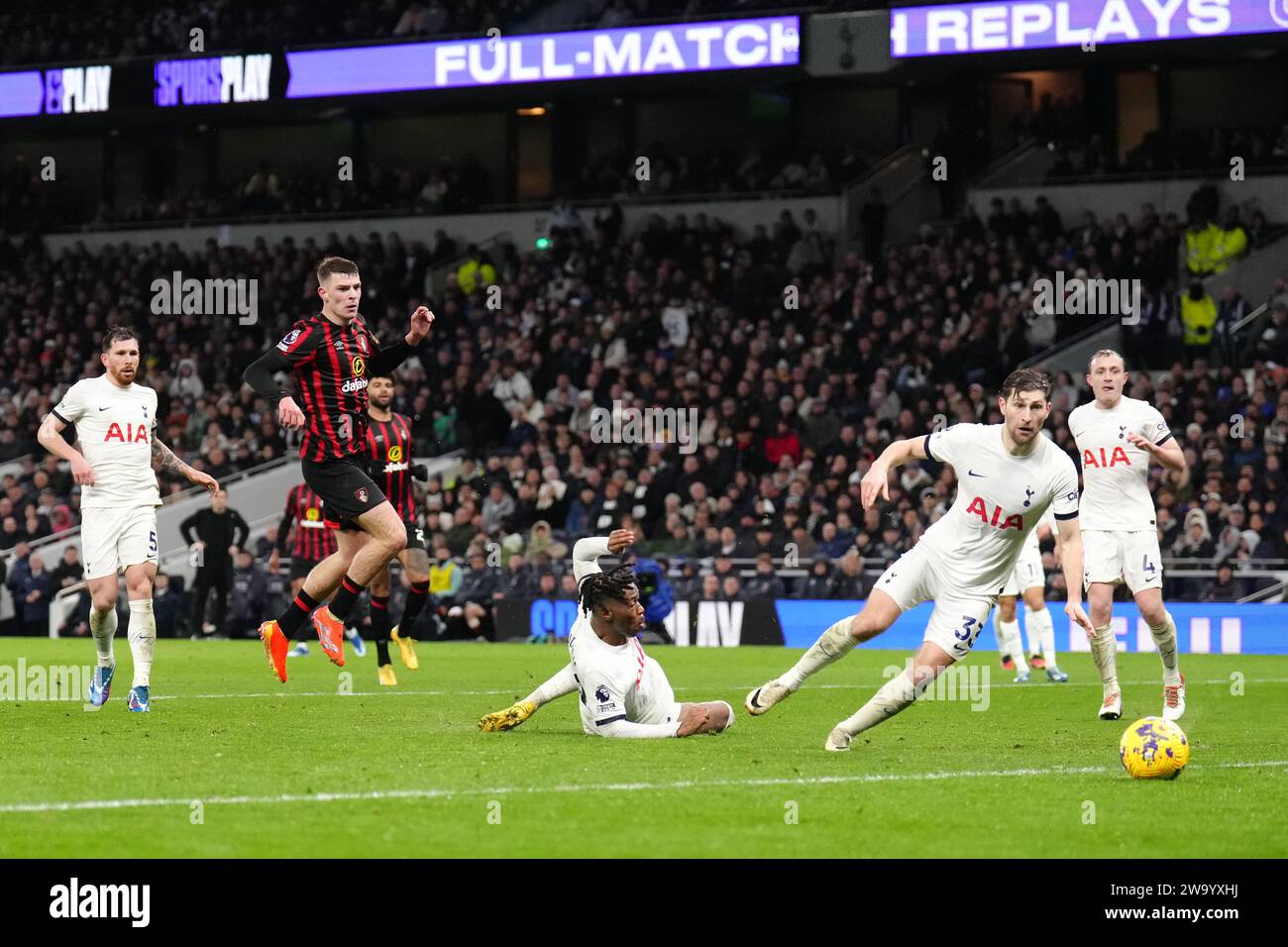 Bournemouth's Alex Scott (second left) scores their side's first goal ...