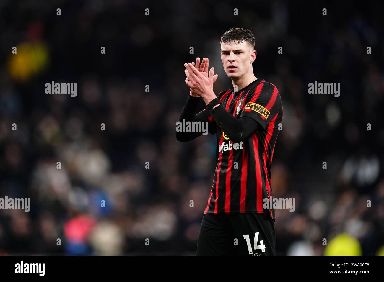 Bournemouth's Alex Scott applauds the fans following the Premier League ...