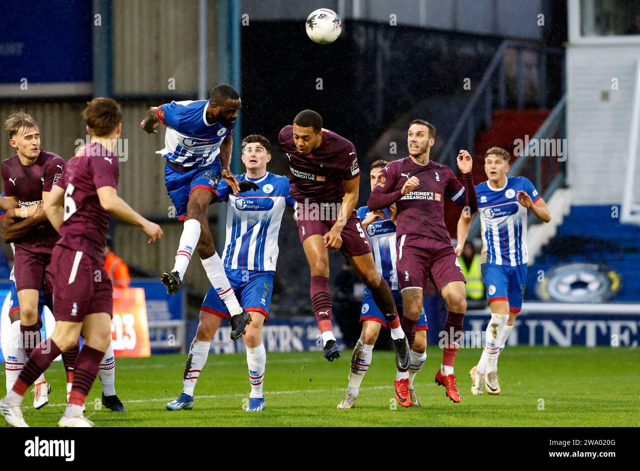 Emmanuel Onariase of Hartlepool United Football Club is tussling with ...