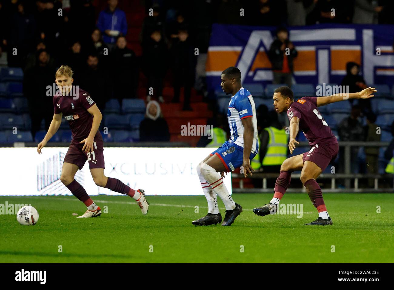 Shaun Hobson of Oldham Athletic Association Football Club is tussling ...
