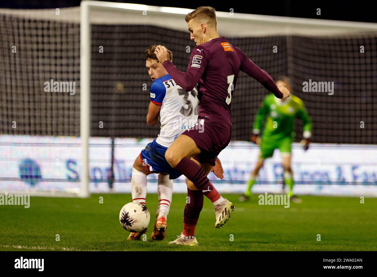 Mark Kitching of Oldham Athletic Association Football Club is playing ...
