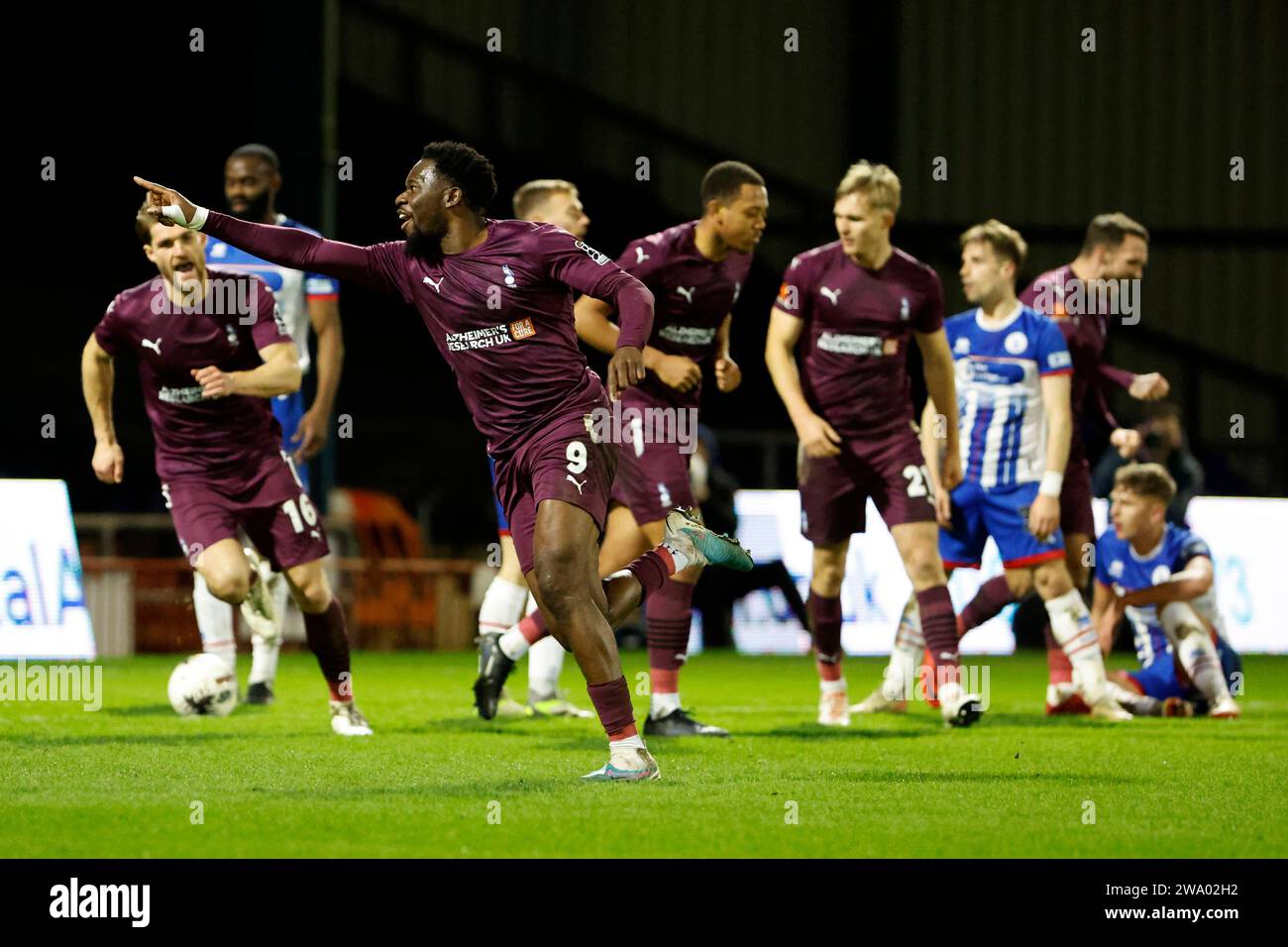 Mike Fondop of Oldham Athletic Association Football Club is celebrating ...