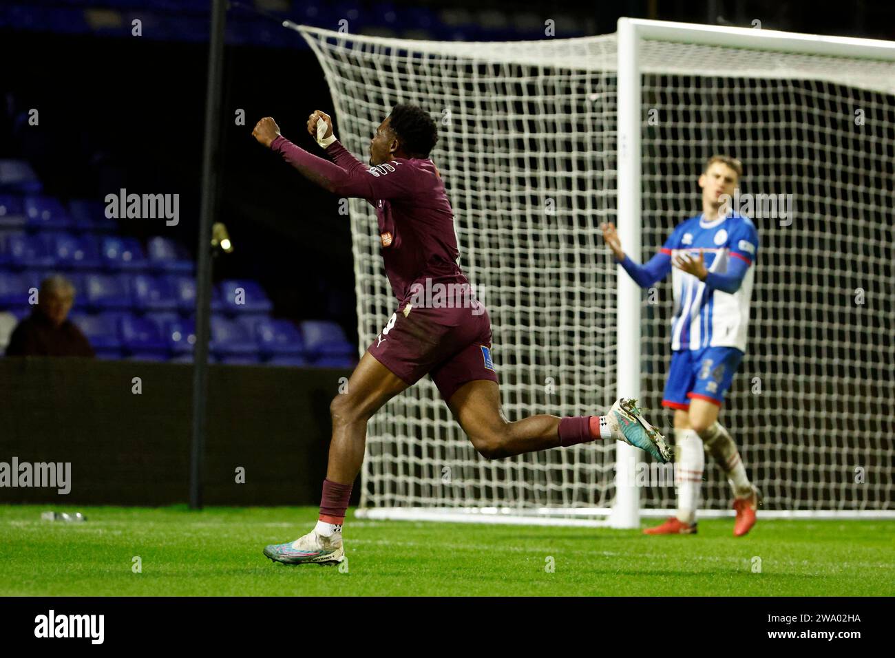 Mike Fondop of Oldham Athletic Association Football Club is celebrating ...