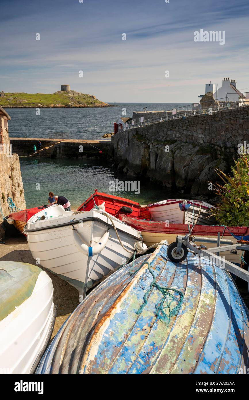 Ireland, Dublin, Dalkey, boats upturned on Coliemore Harbour slipway ...