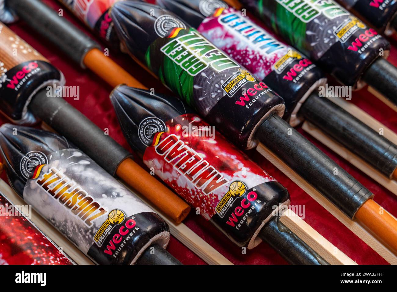 Kammlach, Bavaria, Germany - December 31, 2023: Rocket fireworks spread ...