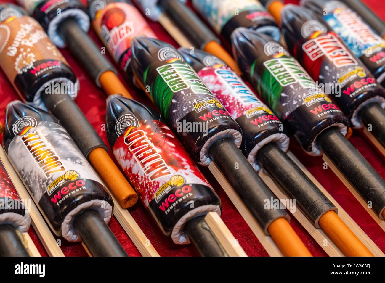 Kammlach, Bavaria, Germany - December 31, 2023: Rocket fireworks spread ...