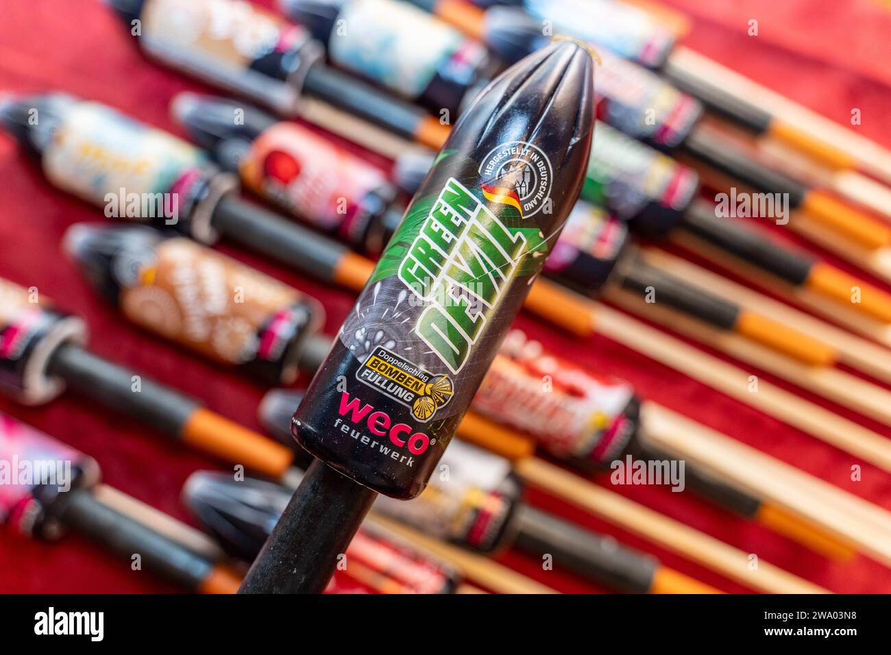Kammlach, Bavaria, Germany - December 31, 2023: Rocket fireworks spread ...