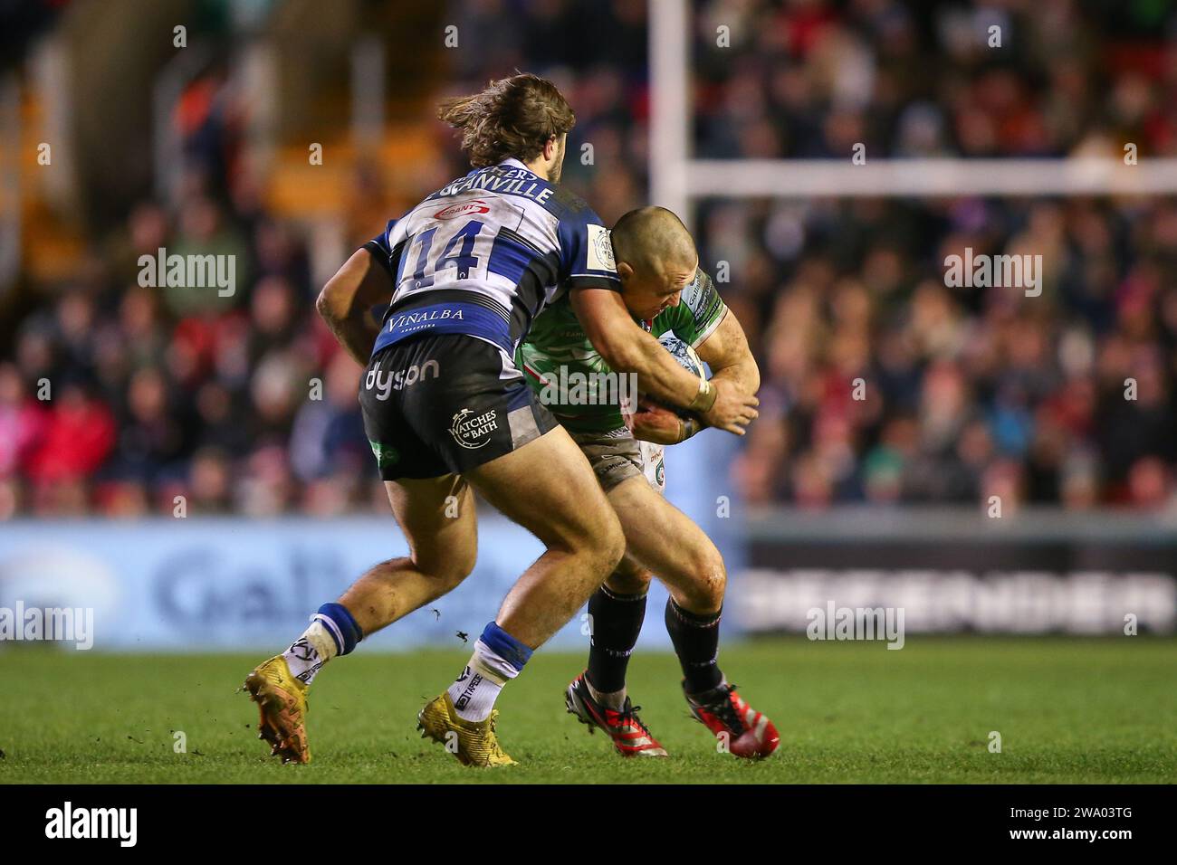 Tom De Glanville of Bath tackles Mike Brown of Leicester Tigers during the Gallagher Premiership ...
