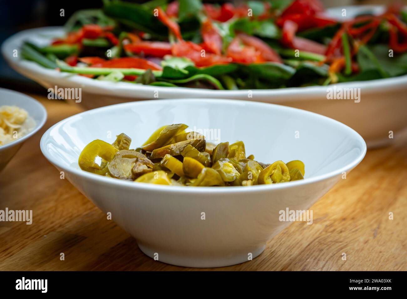 Food laid out on a table ready for a party, with a shallow depth of ...